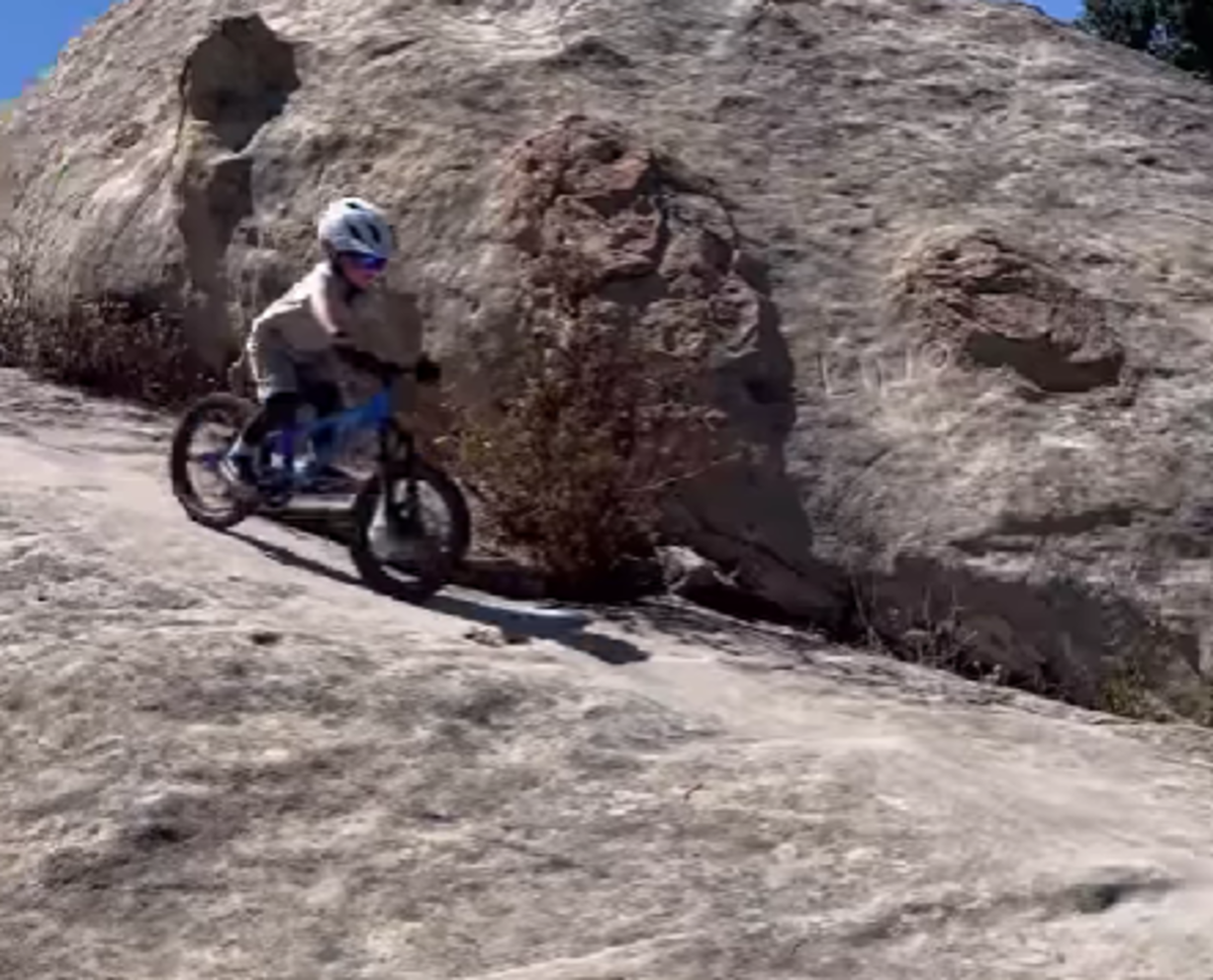 Look: Mountain Biking Kid Rides Down Rock Face