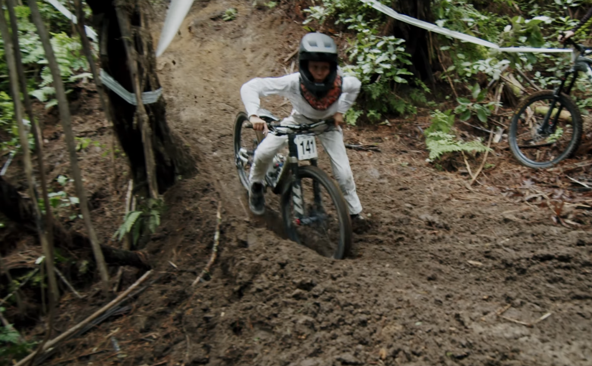 New Zealand Riders Tackle Downhill Course In "Relentless Conditions"