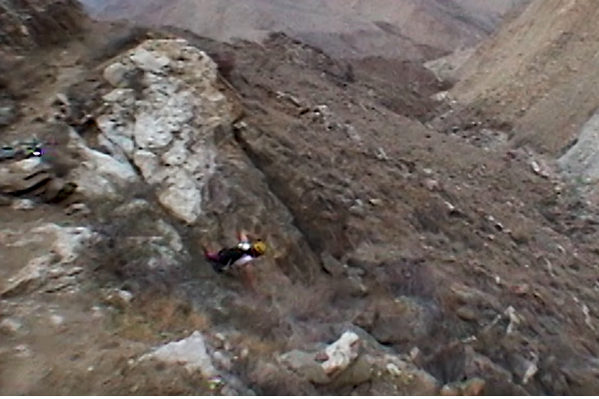 Mountain Biker Falls Off Sheer Cliff In Dramatic Video