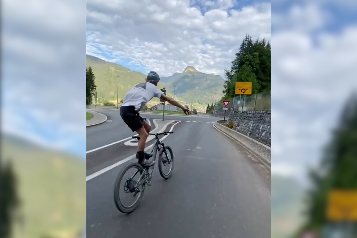Look: Cyclist Defies Physics With Bold Bike Surfing Stunt