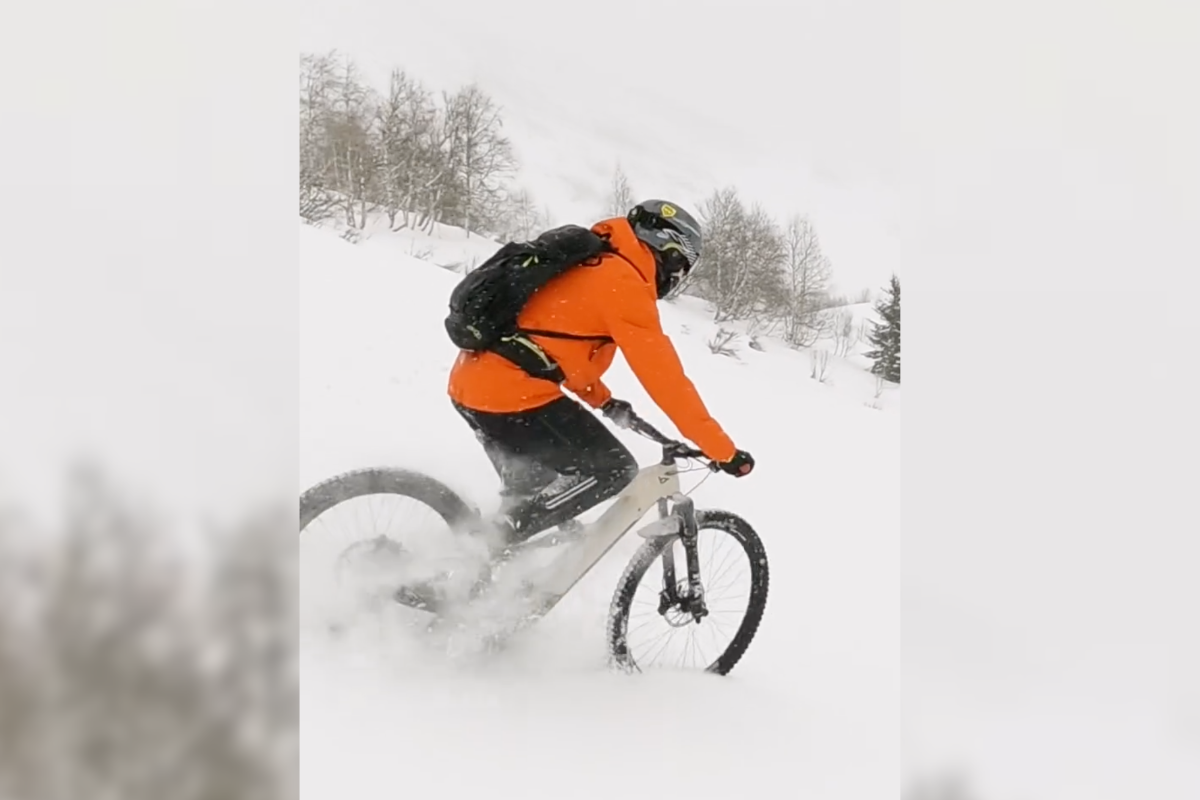 Rider Scores Fresh Powder Turns On His Bike