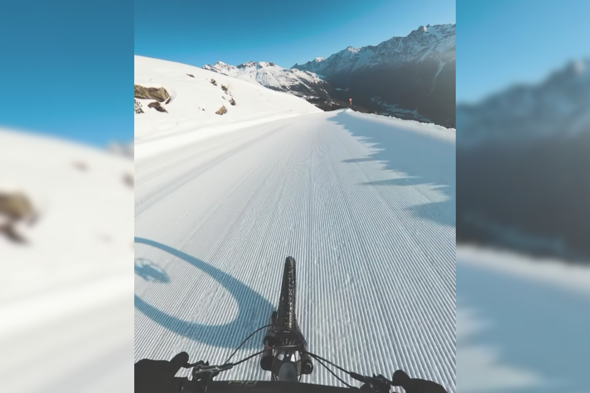 Riders Shred Freshly Groomed Ski Slopes On Mountain Bikes