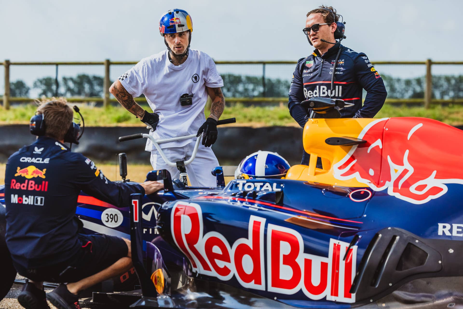 Watch Kriss Kyle Jump a Moving F1 Car - BikeMag