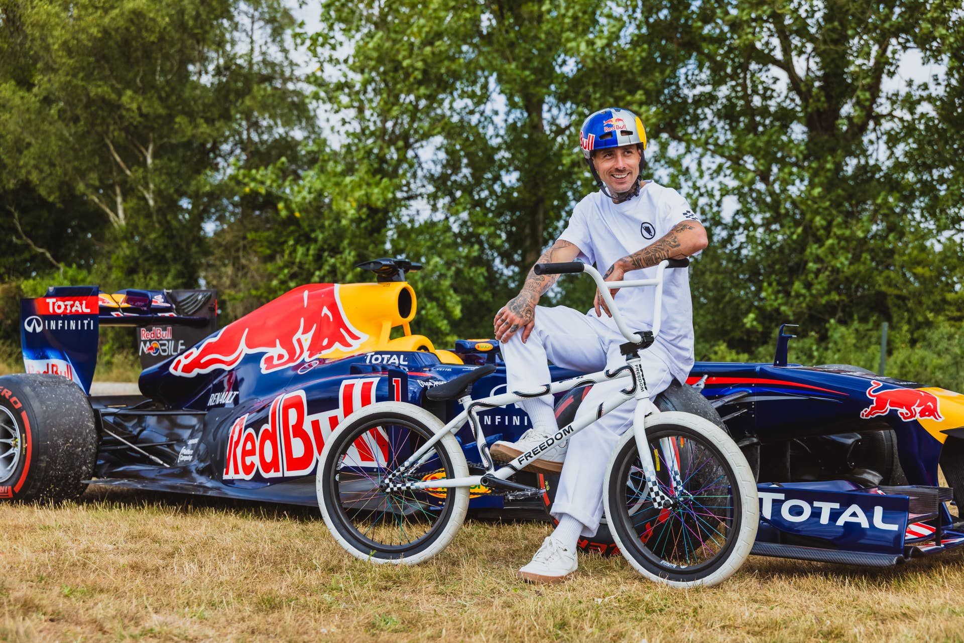 Watch Kriss Kyle Jump a Moving F1 Car - BikeMag